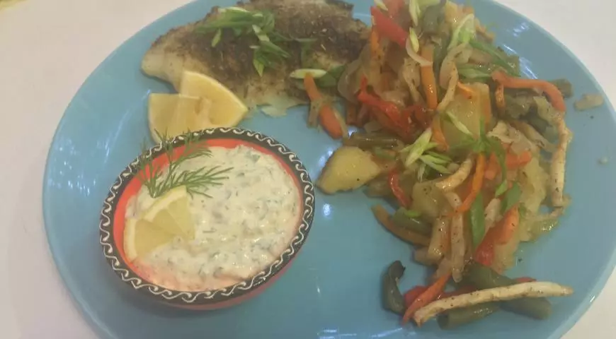 Cooking tilapia fillet baked with vegetables