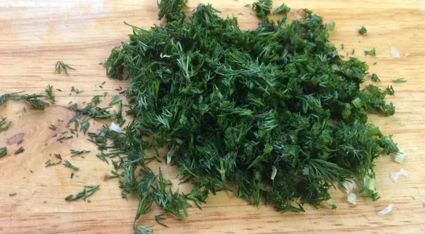 Finely chop dill for salad