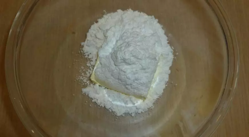 Mix the butter with sugar powder to homogeneous mass