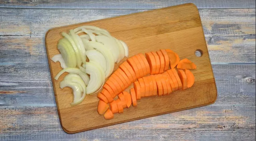 Cut onions and carrots by half rings