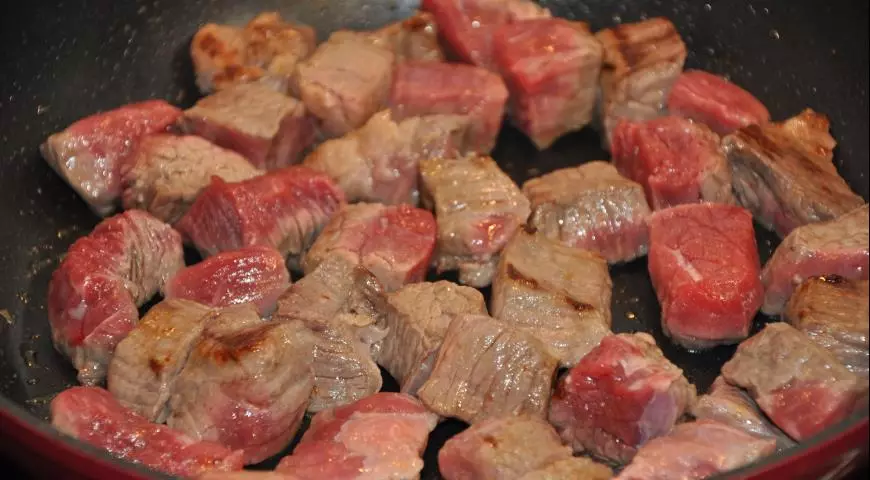 Fry pieces of beef