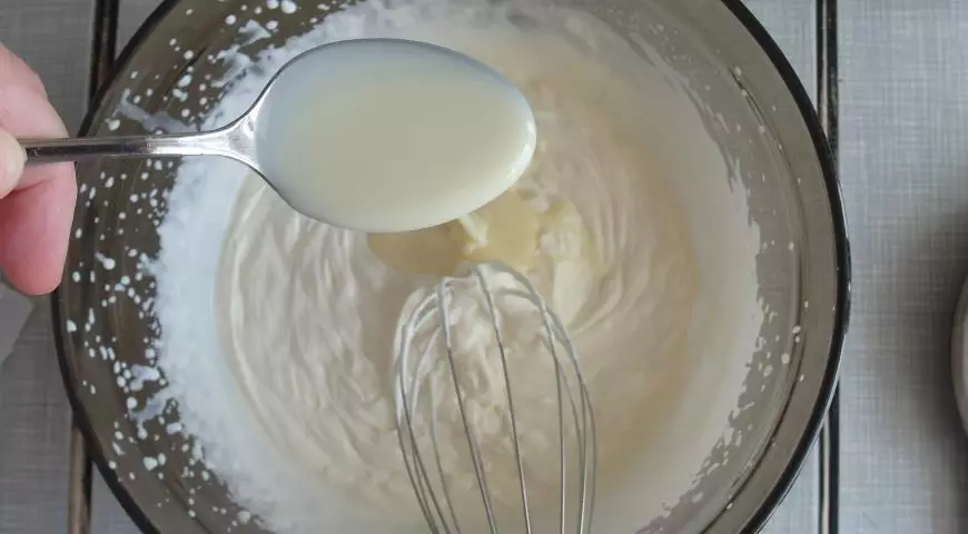 In cream portion add condensed milk, wash