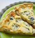 We serve an open pie with pears and Dor-Blu cheese, cutting into portion pieces