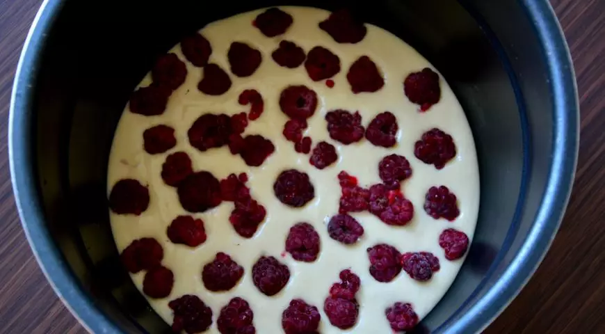 Lay out the dough and raspberry in a slow cooker