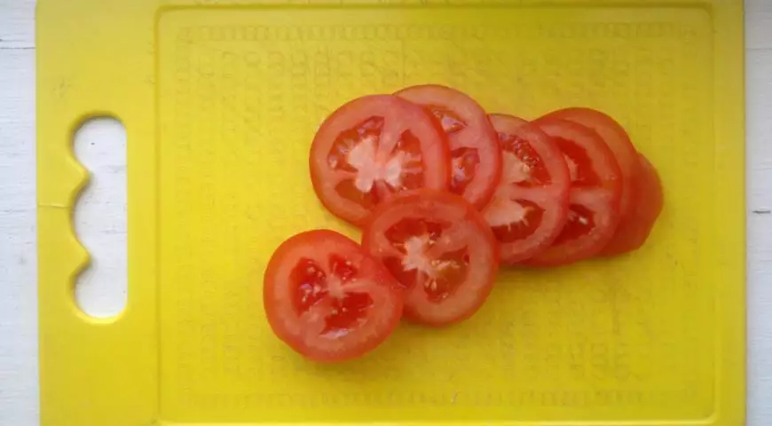 Stock Foto Cooking Recipe: viando kaserolo kun terpomoj kaj tomatoj, paŝo numero 9