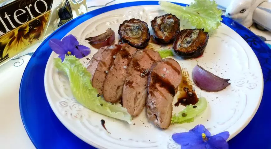 MEDIUM RARE duck breast recipe with dried plums and caramel bow