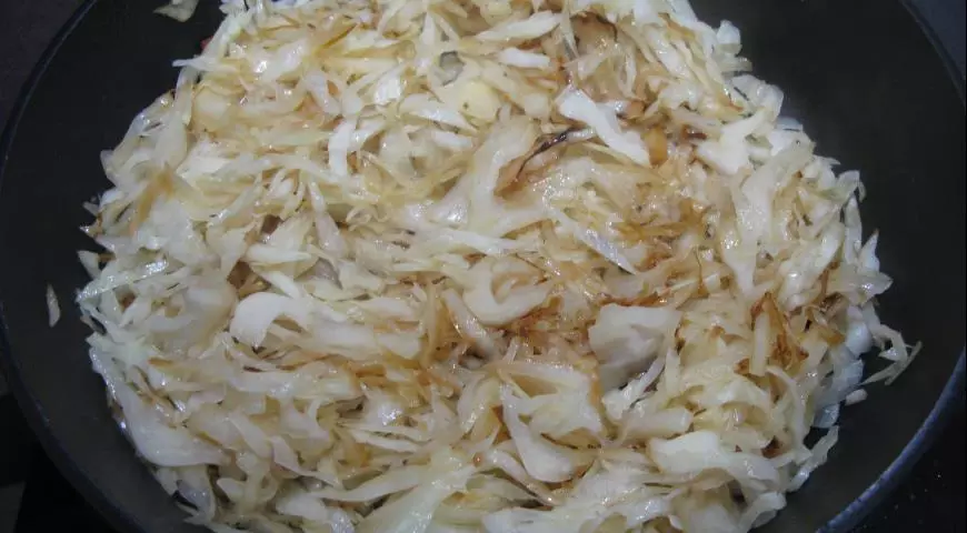 Chopping and fry white cabbage