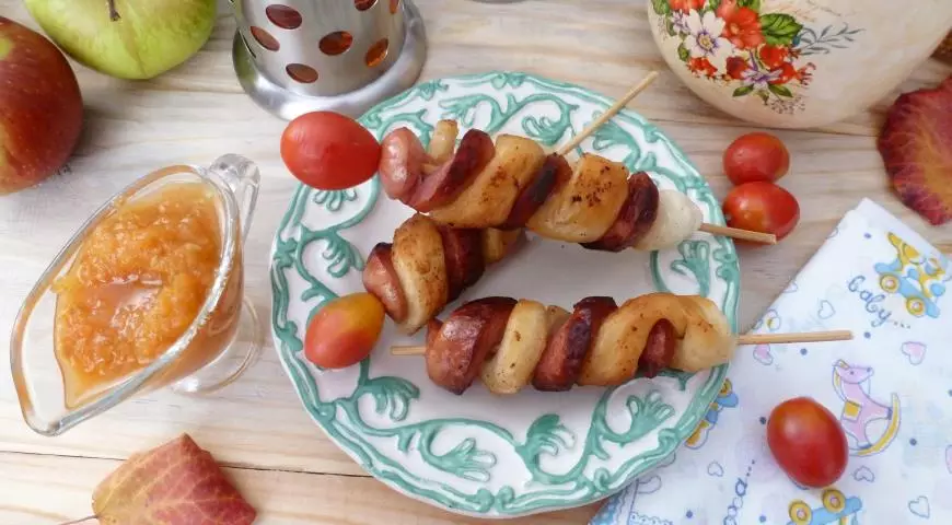 Sausage with dough on a skewer