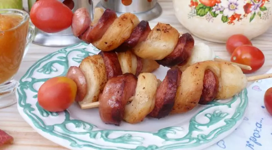 Recipe for sausages with a dough on a skewer