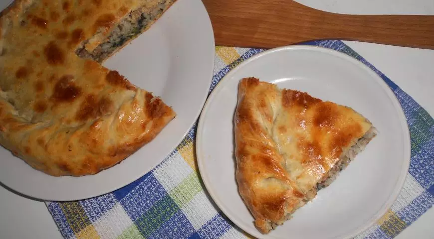 Pie with rice, sardines and nettle