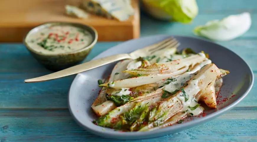 Chicory fried in brown oil with blue cheese sauce