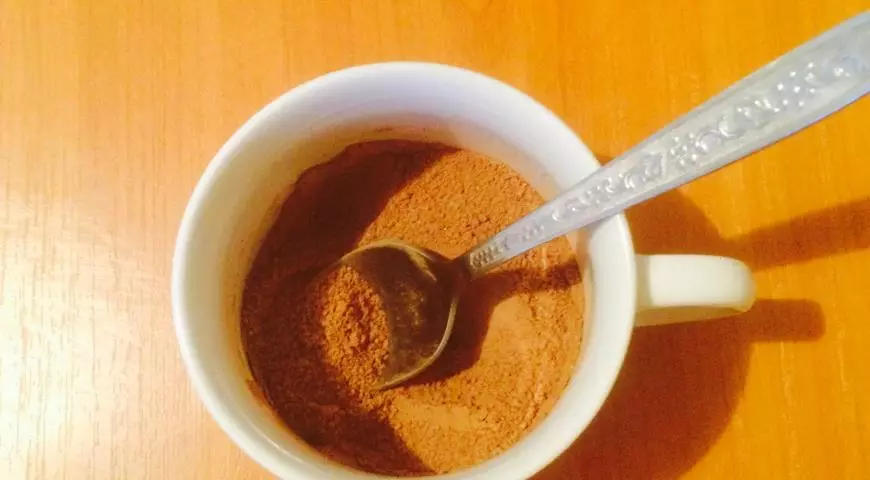 Mix cocoa powder with sugar