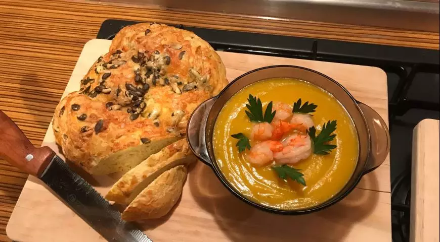 Pumpkin soup with tiger shrimps