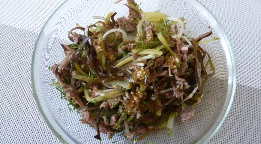 Salad with boiled beef and sea cabbage Pour refueling